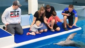 Mighty Miss Maya Meets Her Hero Winter the Dolphin at CMA